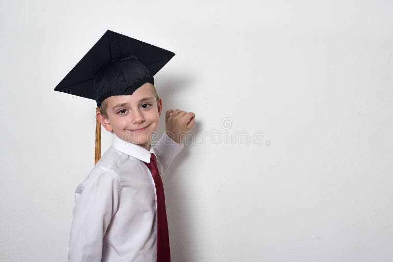 Cute Smiling Boy Wearing Student Hat and School Uniform. Child Write ...