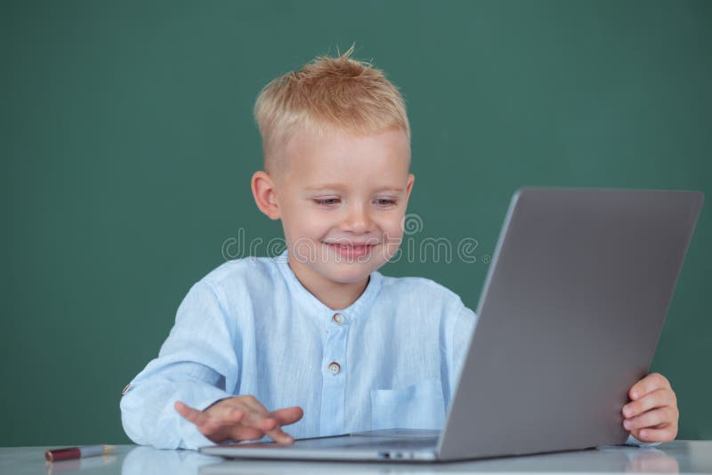 Cute Smiling Child Using Laptop Computer, Kid Boy Studying through ...