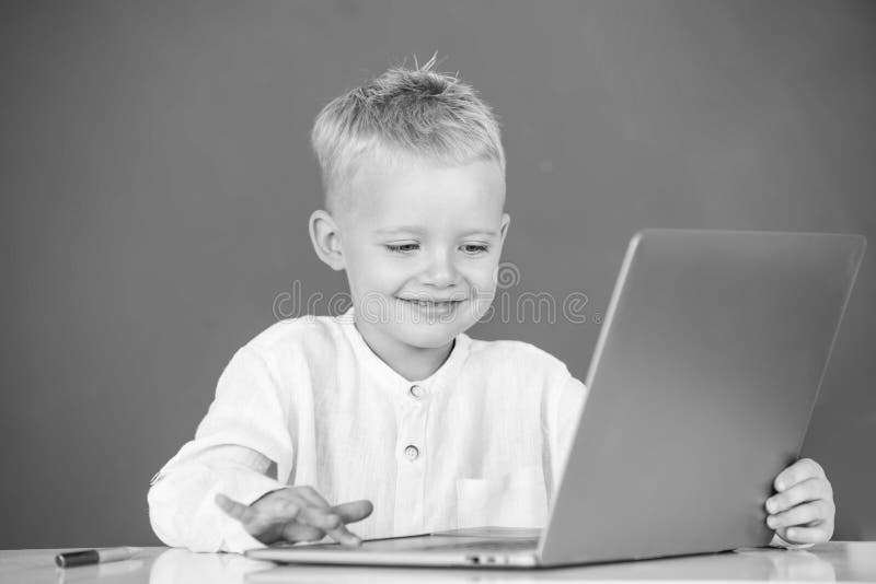 Cute Smiling Child Using Laptop Computer, Kid Boy Studying through ...