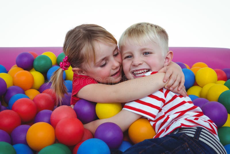 Cute Smiling Kids in Sponge Ball Pool Hugging Stock Image - Image of ...