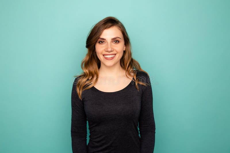 Cute Smiling Lady in a Studio Posing on a Camera Isolated. Stock Photo ...