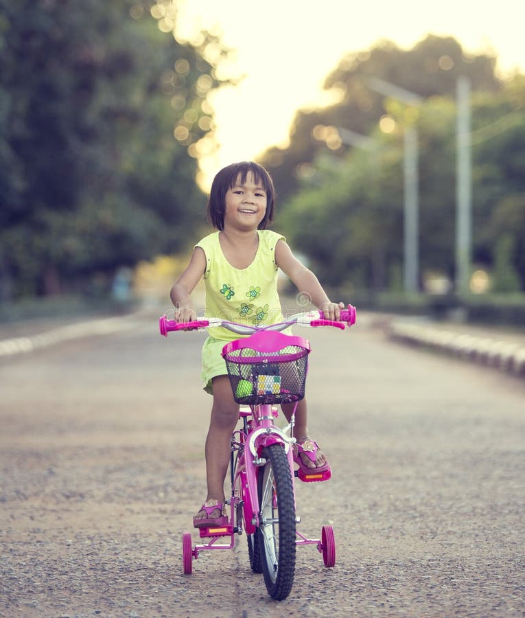 Cute Smiling Little Girl with Bicycle Stock Image - Image of happy ...