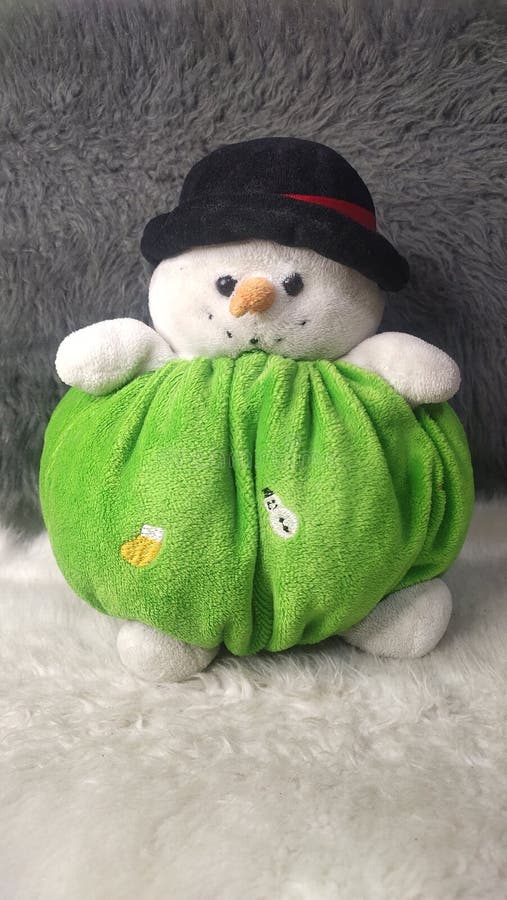 Cute snowman in green stock photo. Image of animal, flower - 260882434