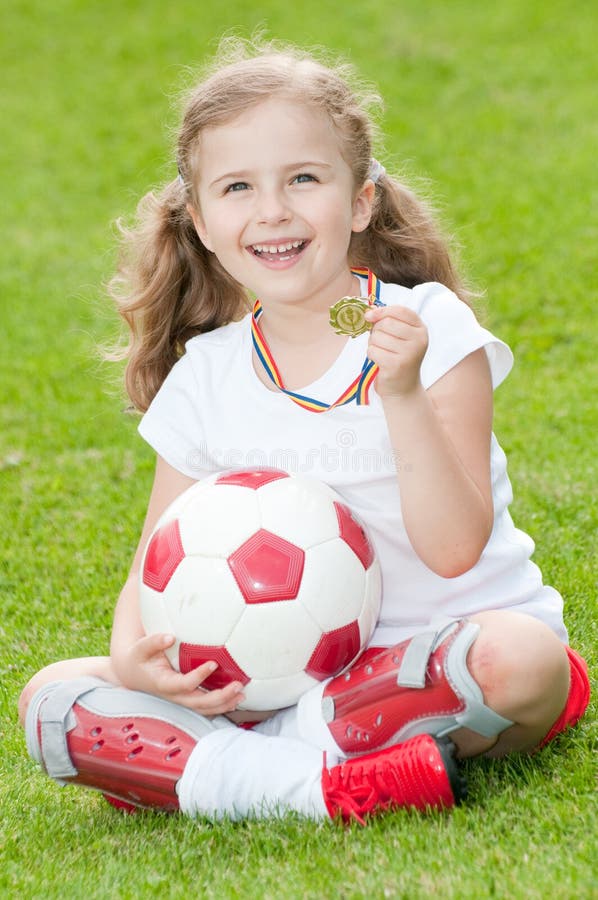 Cute soccer champion stock photo. Image of girl, medal - 14930332