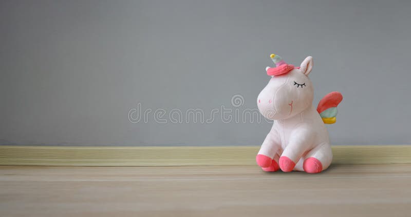 Cute Soft Unicorn Plush Toy on the Floor. Close Up Shot, Empty Space ...