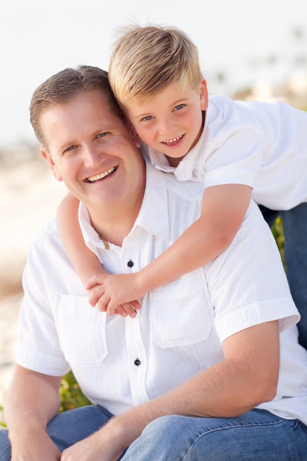 Cute Son with His Handsome Dad Portrait Outside Stock Image - Image of ...