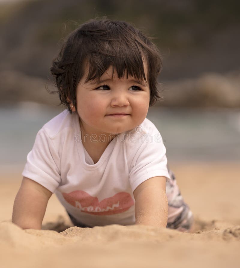 Cute Spanish Baby on a Sandy Beach Stock Image - Image of cute, sand ...