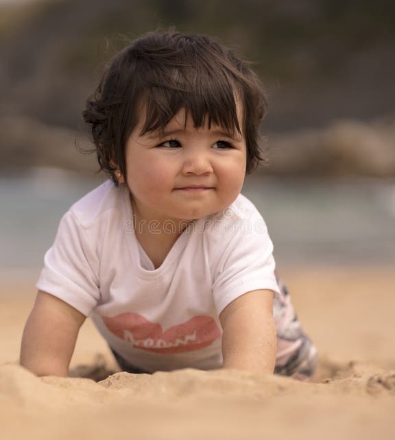 Cute Spanish Baby on a Sandy Beach Stock Image - Image of cute, sand ...
