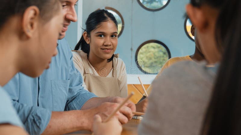 Cute Student Looking at Laptop Screen and Listen Teacher Explain ...