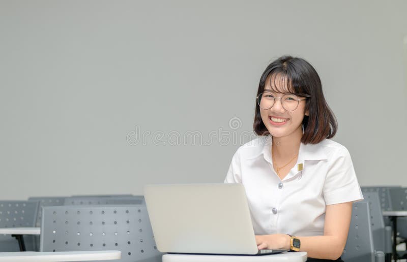 Cute Student Work with Laptop in Classroom Stock Photo - Image of class ...
