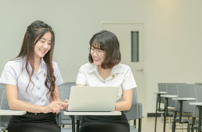 Cute Students in Uniform Working with Laptop Stock Image - Image of ...