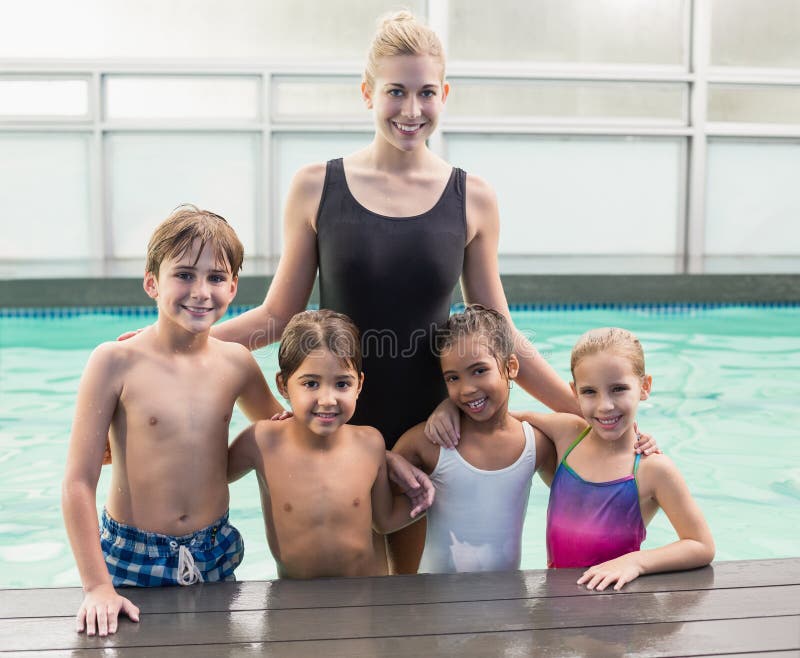 Cute Swimming Class in Pool with Coach Stock Photo - Image of center ...
