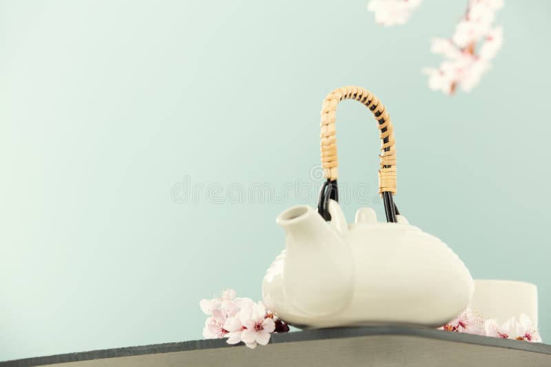 Cute Teapot and Spring Cherry Branches on Blue Background, Copy Space ...