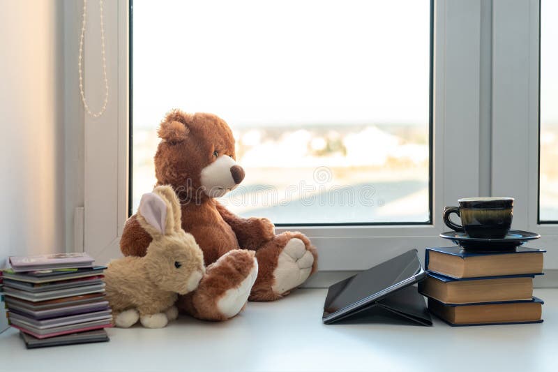 Cute Teddy Bear and Bunny Looking in Tablet Computer or Touch Pad at ...