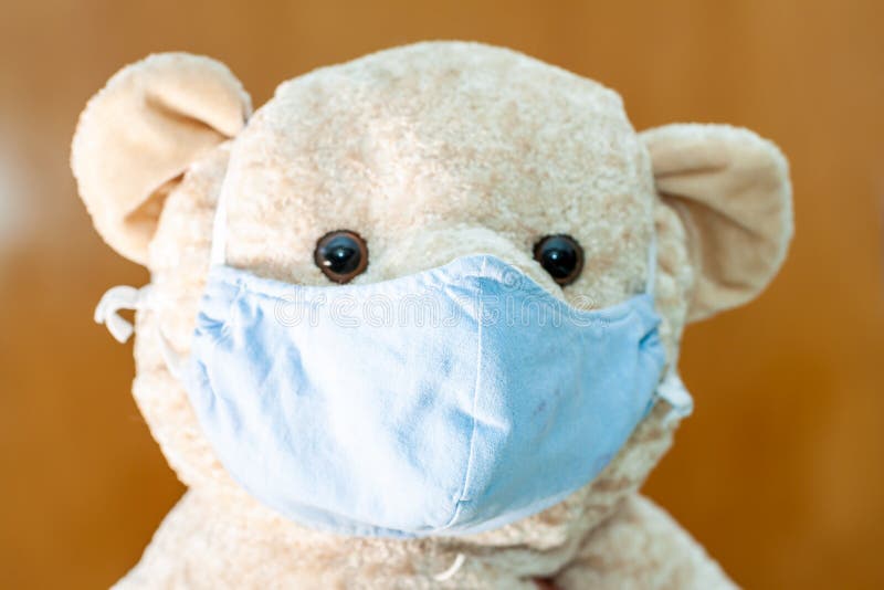 Cute Teddy Bear Wearing a Mask - Focus on the Mask Stock Photo - Image ...