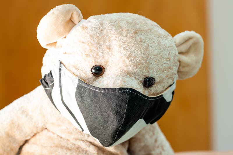 Cute Teddy Bear Wearing a Mask - Focus on the Mask Stock Image - Image ...