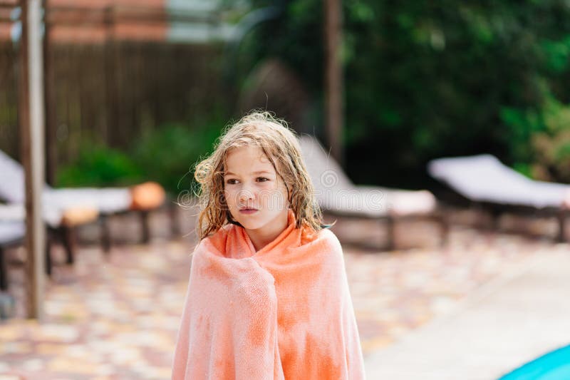 Cute Teenage Girl With Wet Hair And In A Towel After Swimming In The