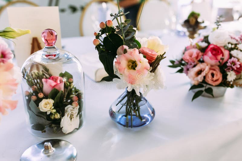 Cute Tiny Bouquet of the Pink Flowers on the Table Stock Image - Image ...