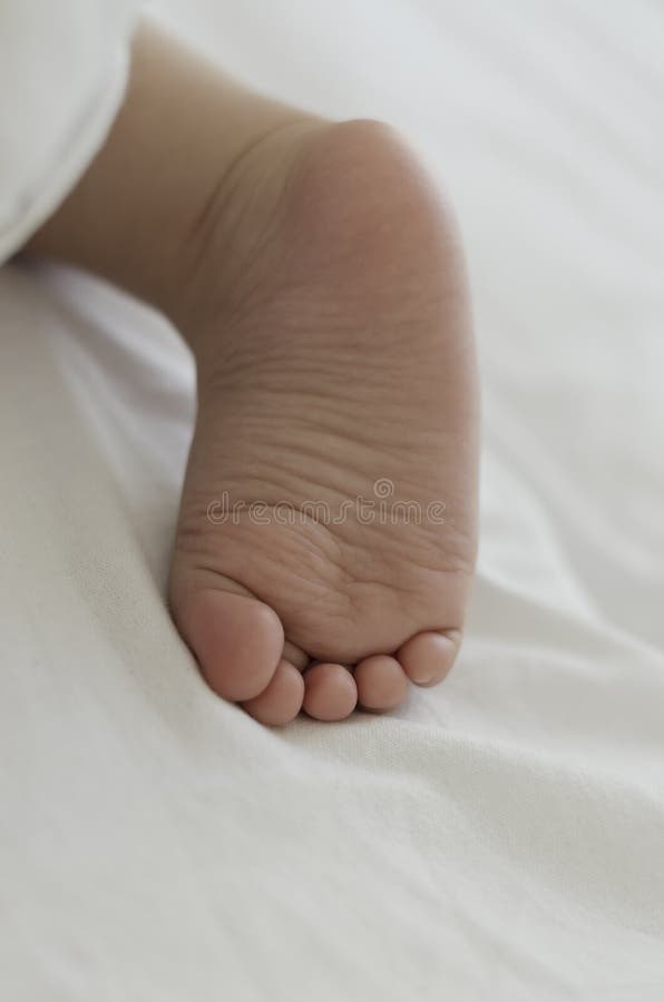 Cute tiny little baby feet stock image. Image of finger - 83742851