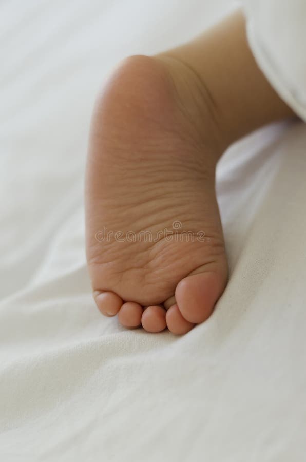 Cute tiny little baby feet stock image. Image of closeup - 84135739