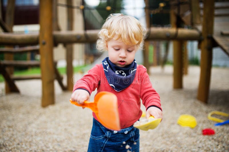 Toddler Boy Playing in the Playground, Summer Day. Stock Image - Image ...