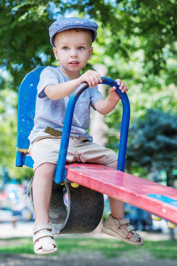 Cute Toddler Boy Riding on a Swing Stock Photo - Image of freedom ...