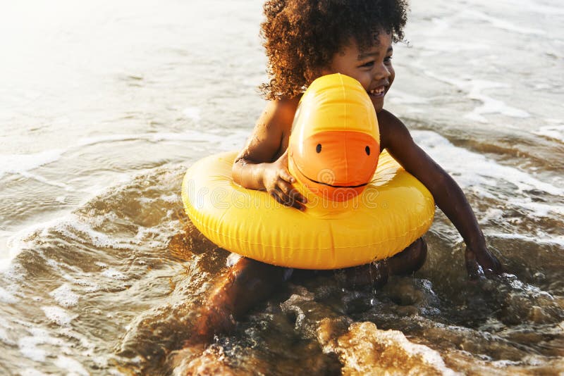Cute Toddler with Duck Tube on the Beach Stock Image - Image of duck ...