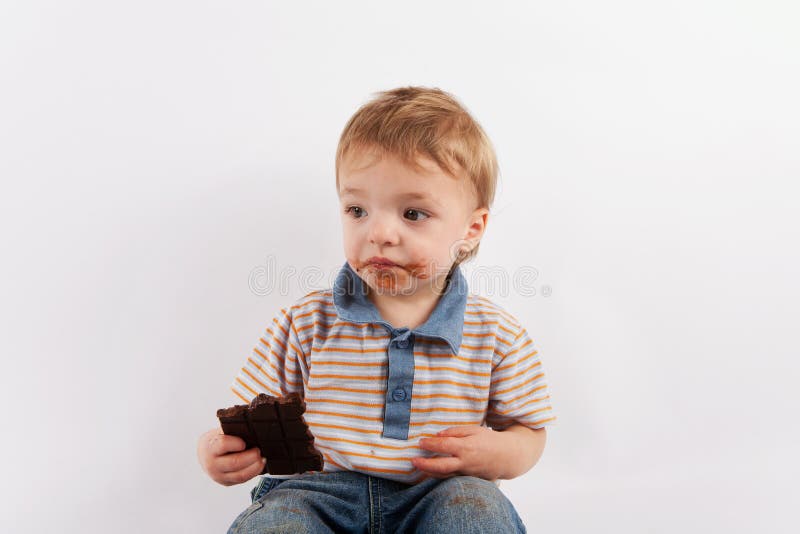 Cute Toddler Eating a Chocolate Bar Stock Photo - Image of tasty, candy ...