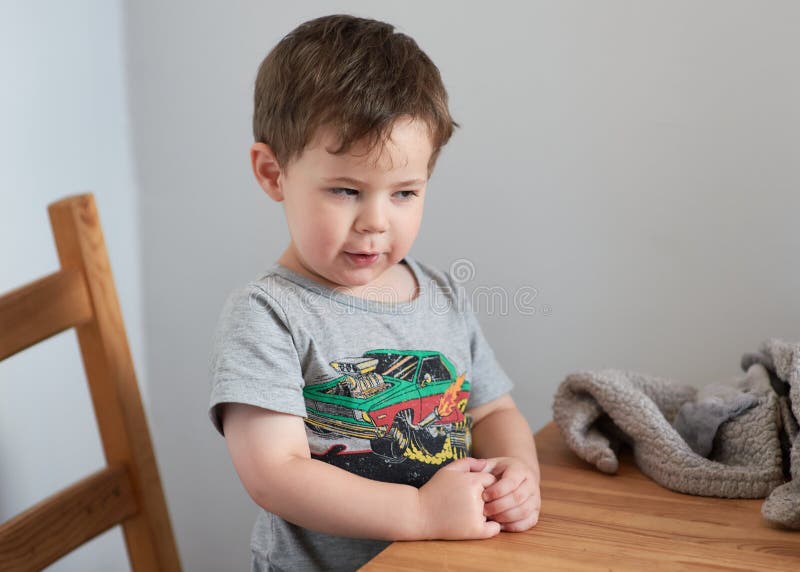 Young Boy Making Faces at the Kitchen Table Stock Photo - Image of baby ...