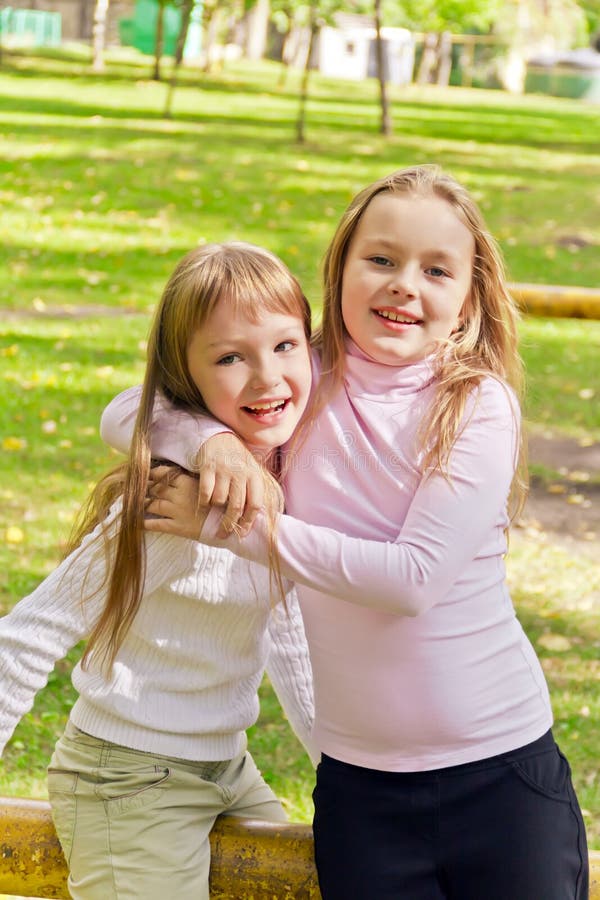 Cute two playing girls stock photo. Image of seven, jump - 50046742