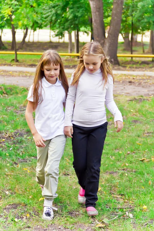 Cute two walking girls stock image. Image of girl, child - 90446551