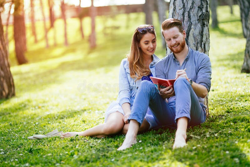 Cute Uni Students Studying Together Stock Image - Image of book, laptop ...