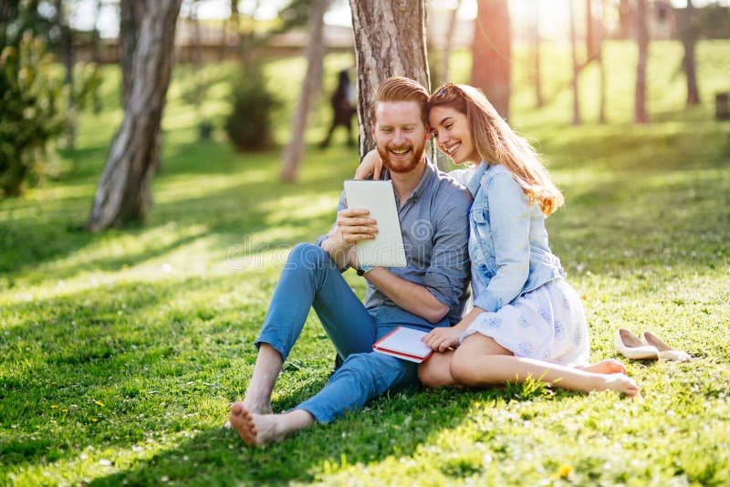 Cute University Students Studying Stock Image - Image of outdoors ...