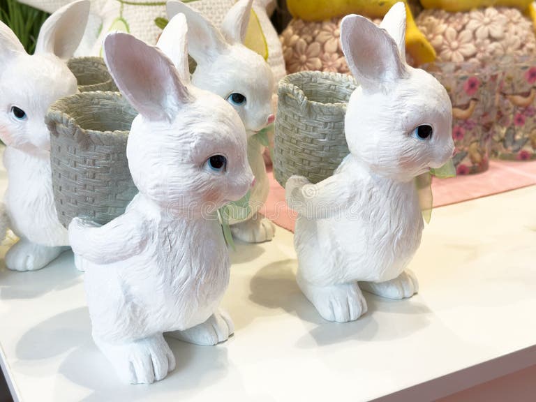 Cute White Bunny Figurines with Wicker Baskets on Display Easter ...
