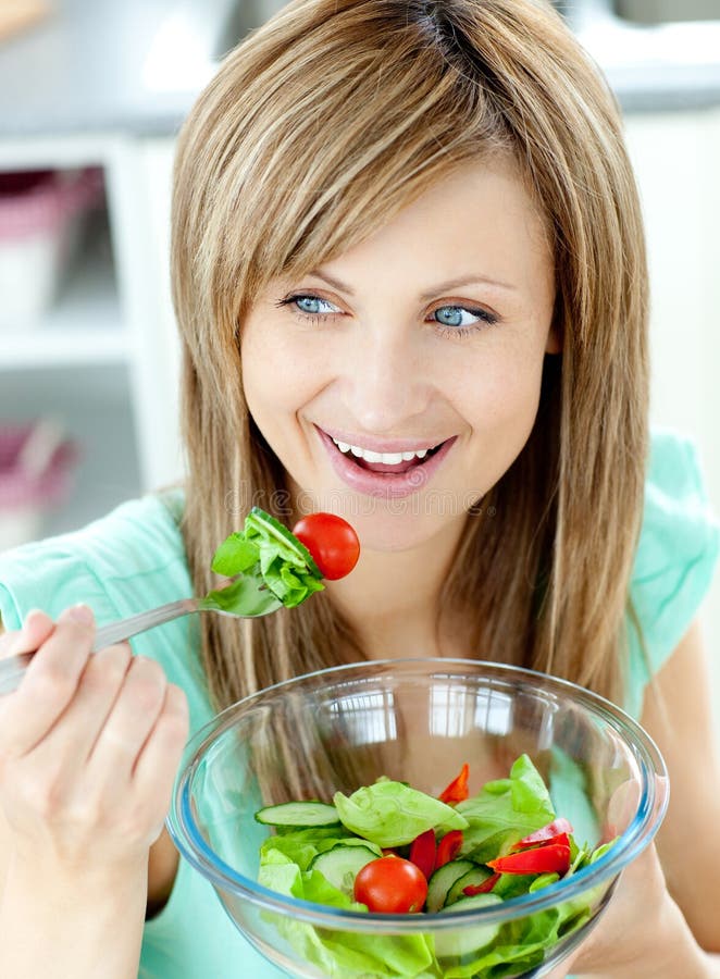 Cute Woman Eating a Salad in the Kitchen Stock Photo - Image of joyful ...
