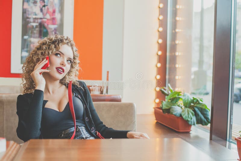 Cute woman phone in cafe stock photo. Image of happy - 214879302