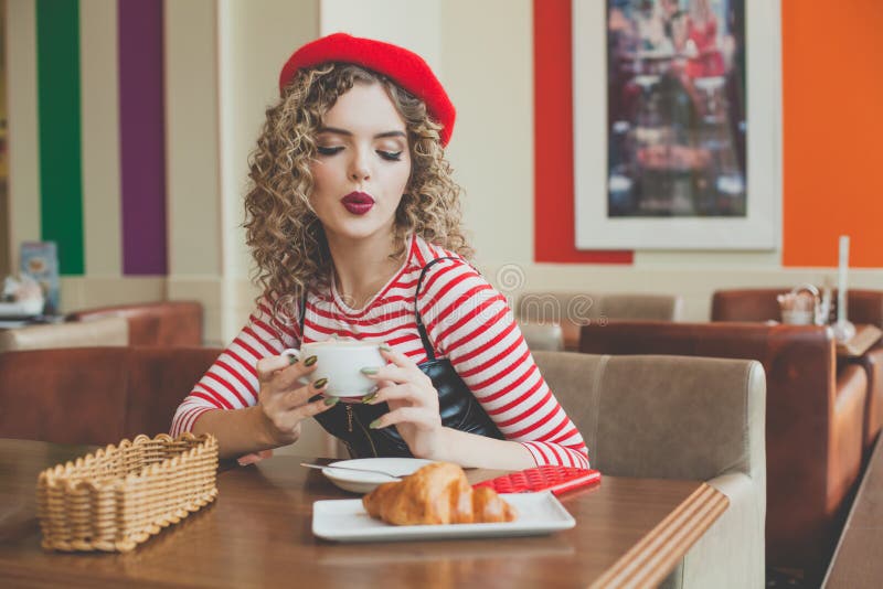 Cute Woman in Red Beret Drinking Coffee in Cafe Stock Image - Image of ...