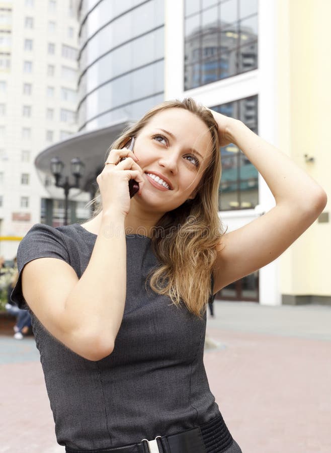 Woman Talking on Mobile Phone Stock Photo - Image of outdoors ...