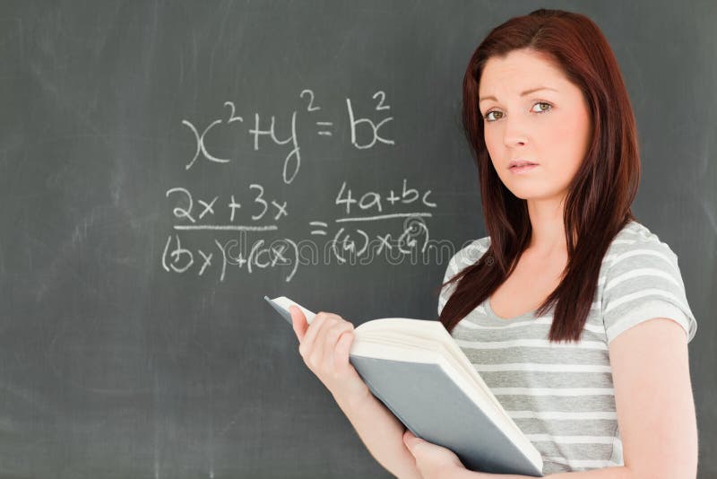 Cute Woman Trying To Solve a Stock Photo - Image of hair, desk: 19926638