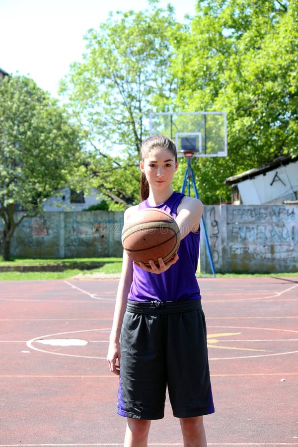 Cute Young Basketball Player Stock Photo - Image of outdoor, basket ...