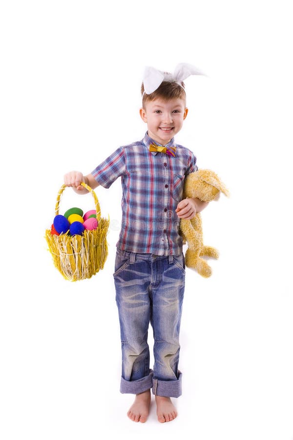 Cute Young Boy in an Image of an Easter Bunny with Eggs Stock Photo ...