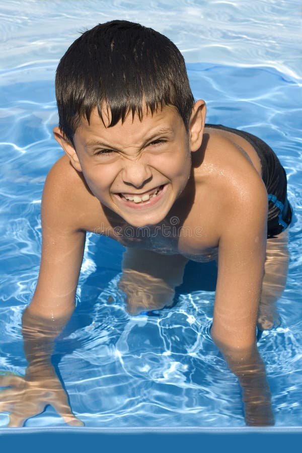 Cute young boy in pool stock image. Image of blue, portrait - 6005953