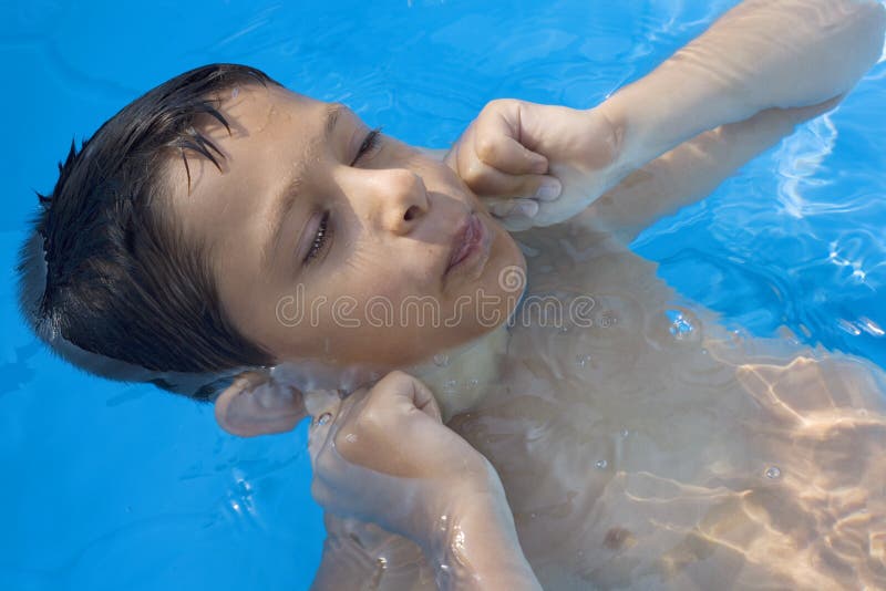 Cute young boy in pool stock image. Image of smile, little - 6026477