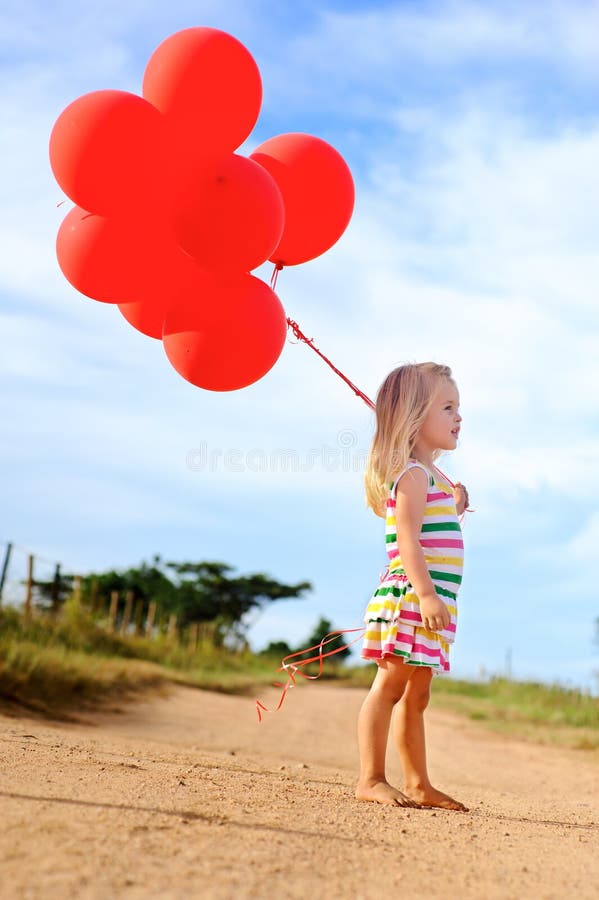 Cute Young Child with Balloons Stock Photo - Image of smile, path: 20378924
