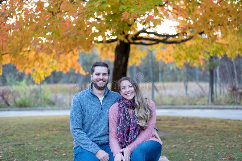 Cute Young Couple at the Park on a Fall Day Stock Photo - Image of ...