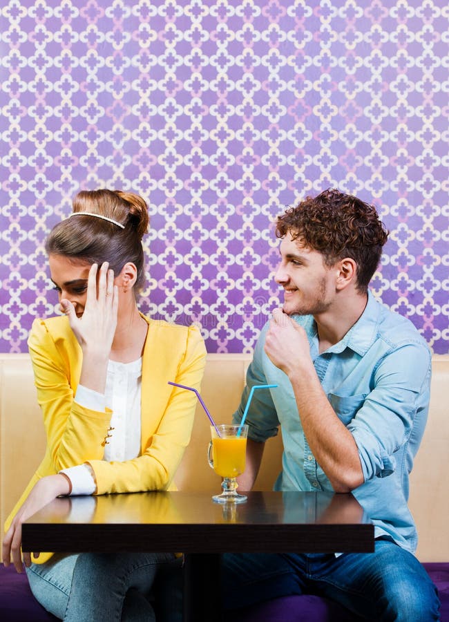 Cute Young Couple Sitting at the Table Stock Image - Image of colorful ...