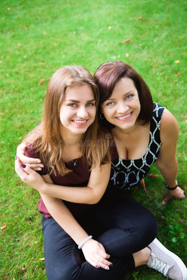 Cute Young Daughter Embracing Her Mother with Love. Stock Image - Image ...