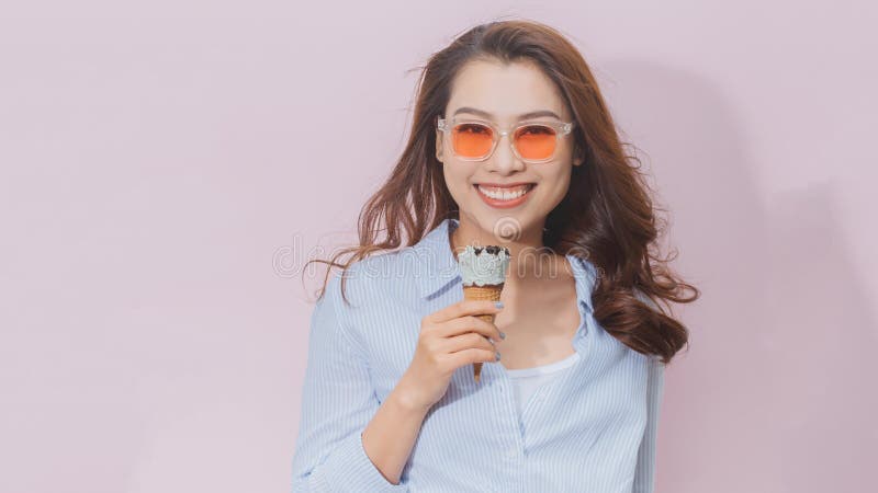 Cute Young Female Model Eating Ice Cream Cone Stock Photo - Image of ...