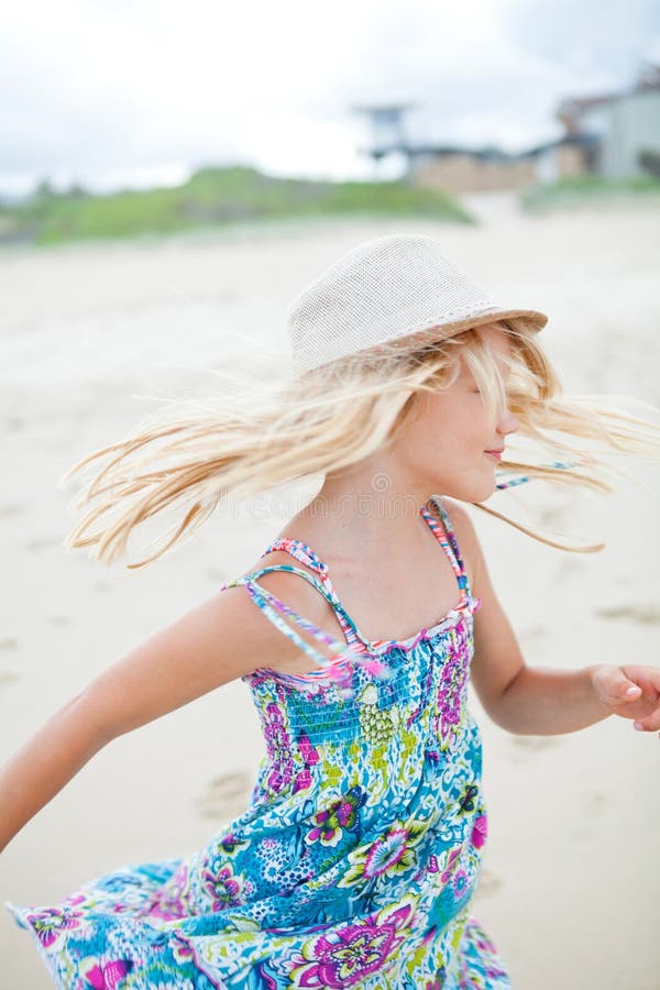 Cute Young Girl Having Fun at Beach Stock Photo - Image of trendy ...
