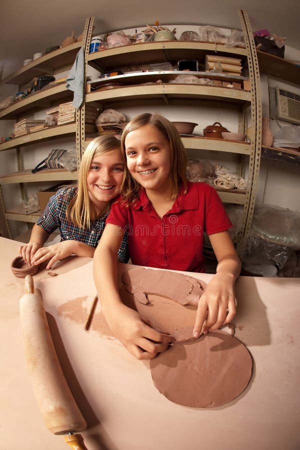Cute Young Girls in a Clay Studio Stock Image - Image of child, cute ...